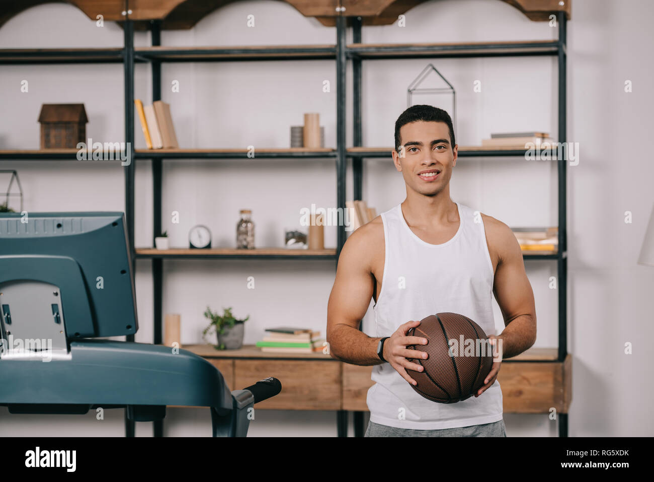 Smiling bi racial sportsman hi-res stock photography and images - Alamy