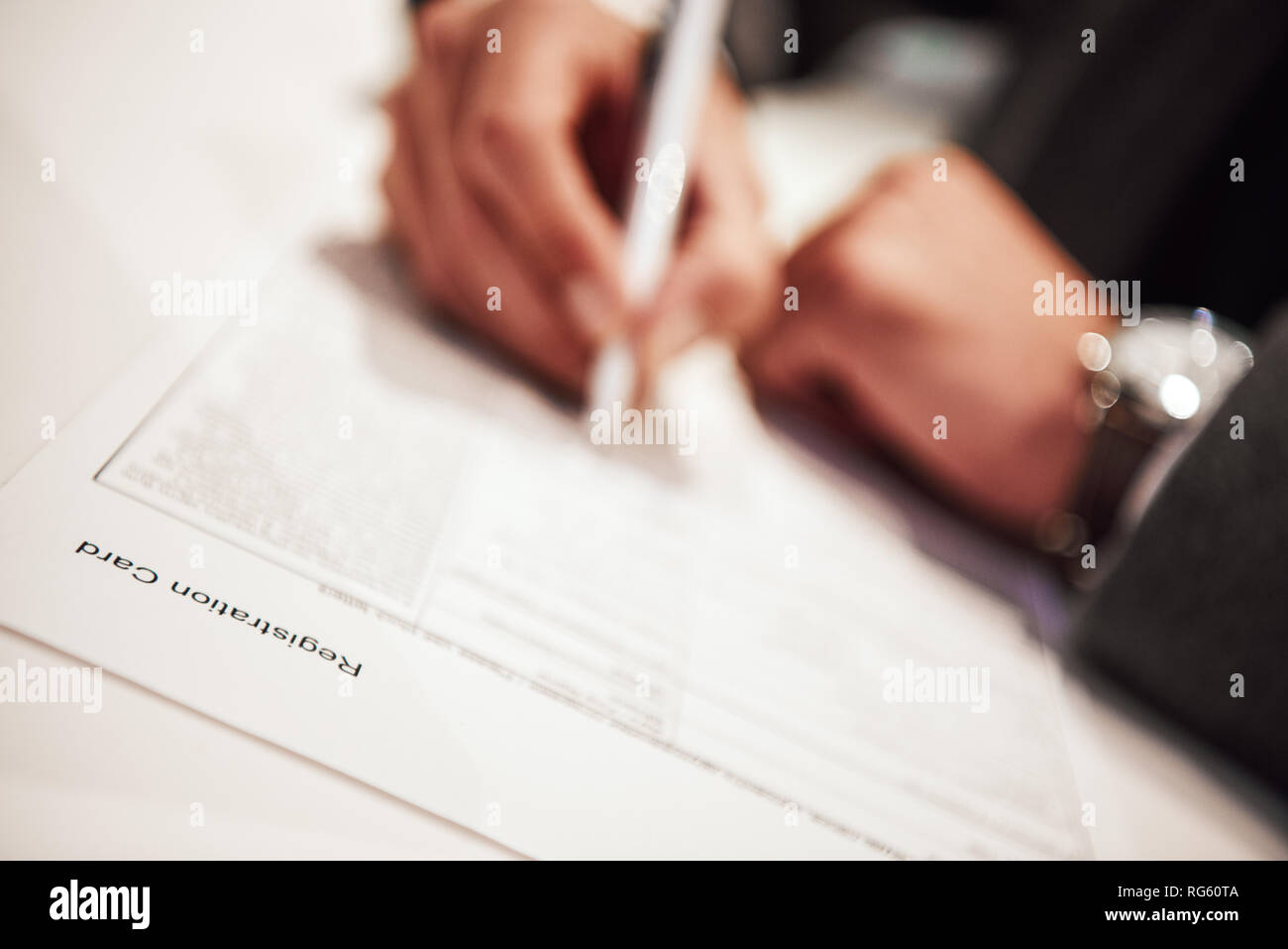 Time to sign deal contract. Businessman is fulfilling and signing ...