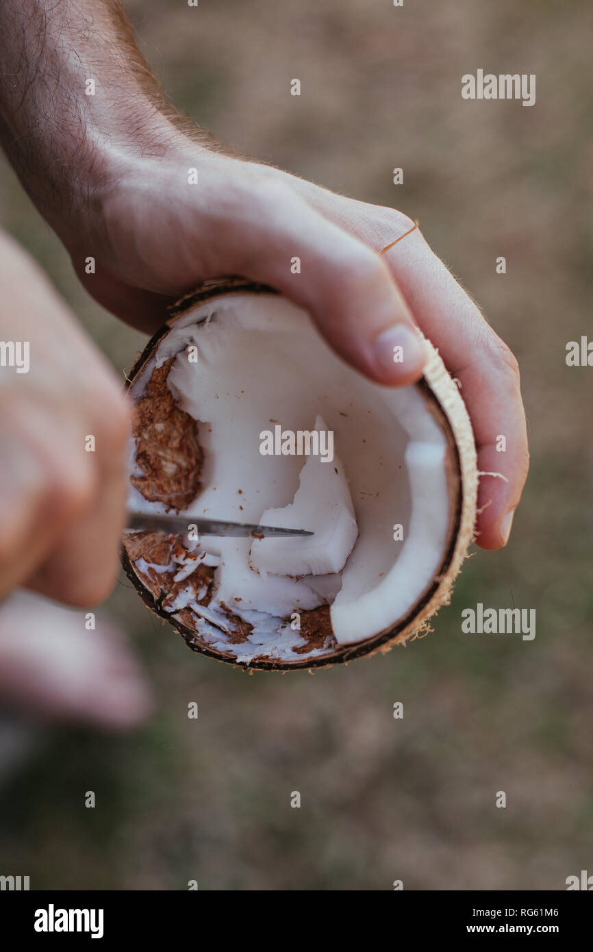 Cutting the coconut shell hi-res stock photography and images - Alamy