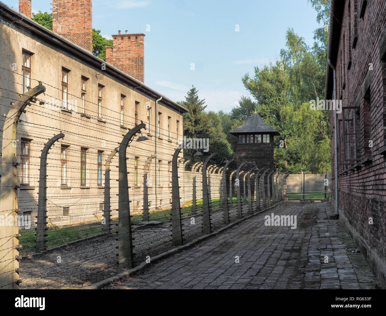 Auschwitz-Birkenau, Poland - July 31, 2017: Tenements and watchtowers ...