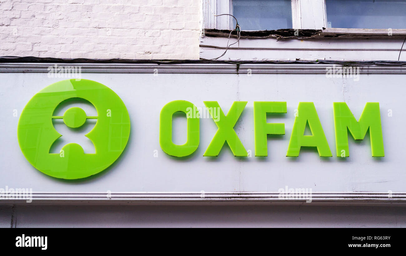 Oxfam charity shop sign Stock Photo - Alamy