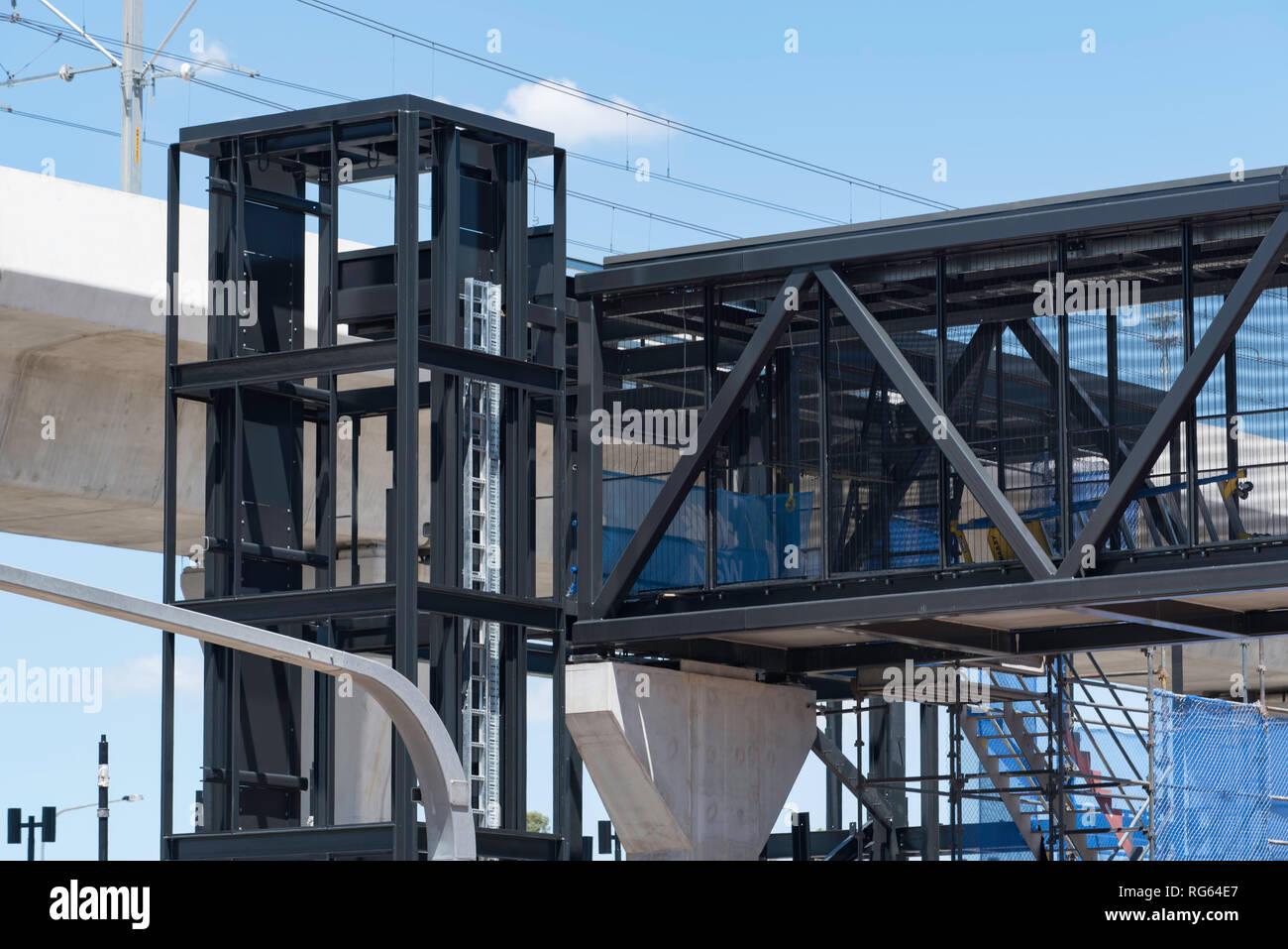 A new elevator and pedestrian overpass that will cross eight lanes of ...