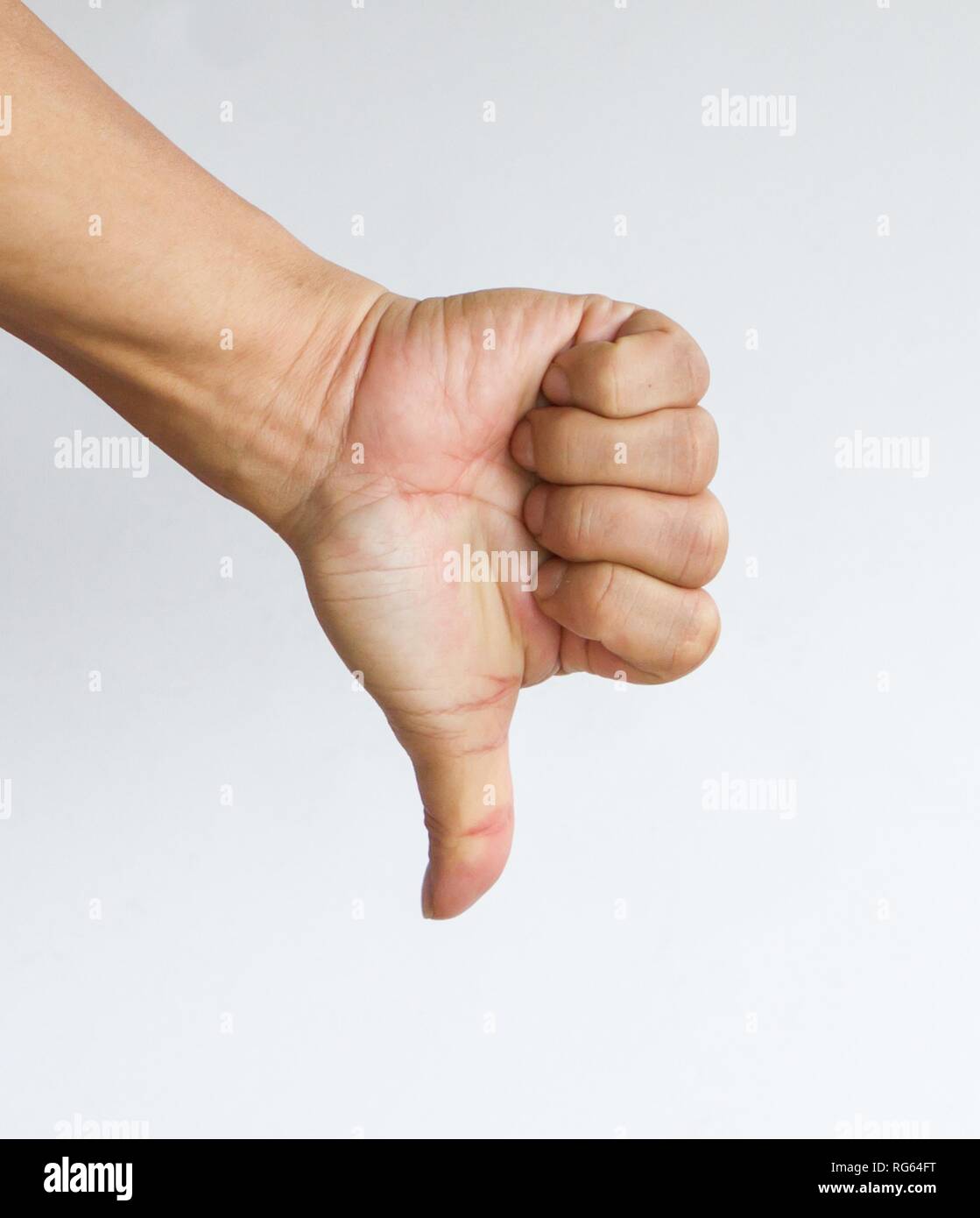 Thumbs down sign from a male hand Stock Photo - Alamy