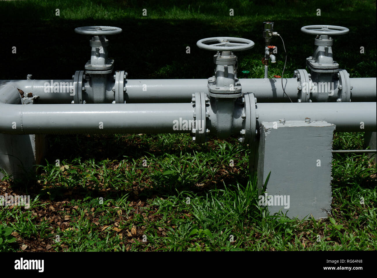 Metal pipe and valve Stock Photo - Alamy