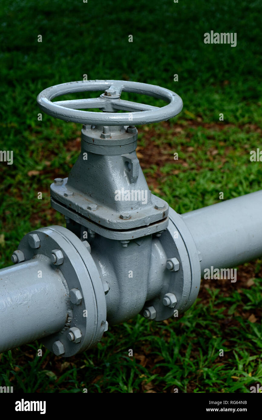 Metal pipe and valve Stock Photo - Alamy