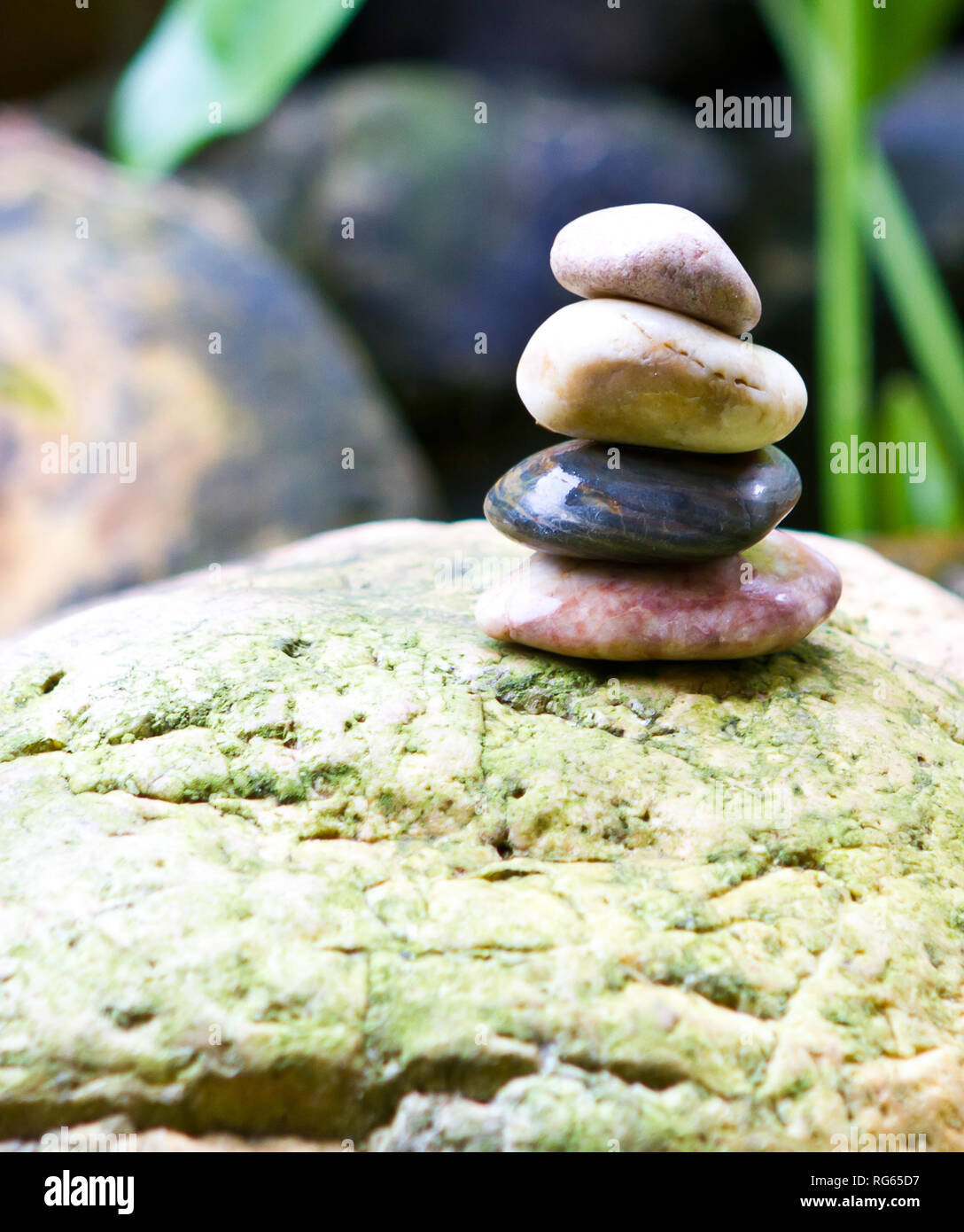Stones stacked up representing zen Stock Photo - Alamy