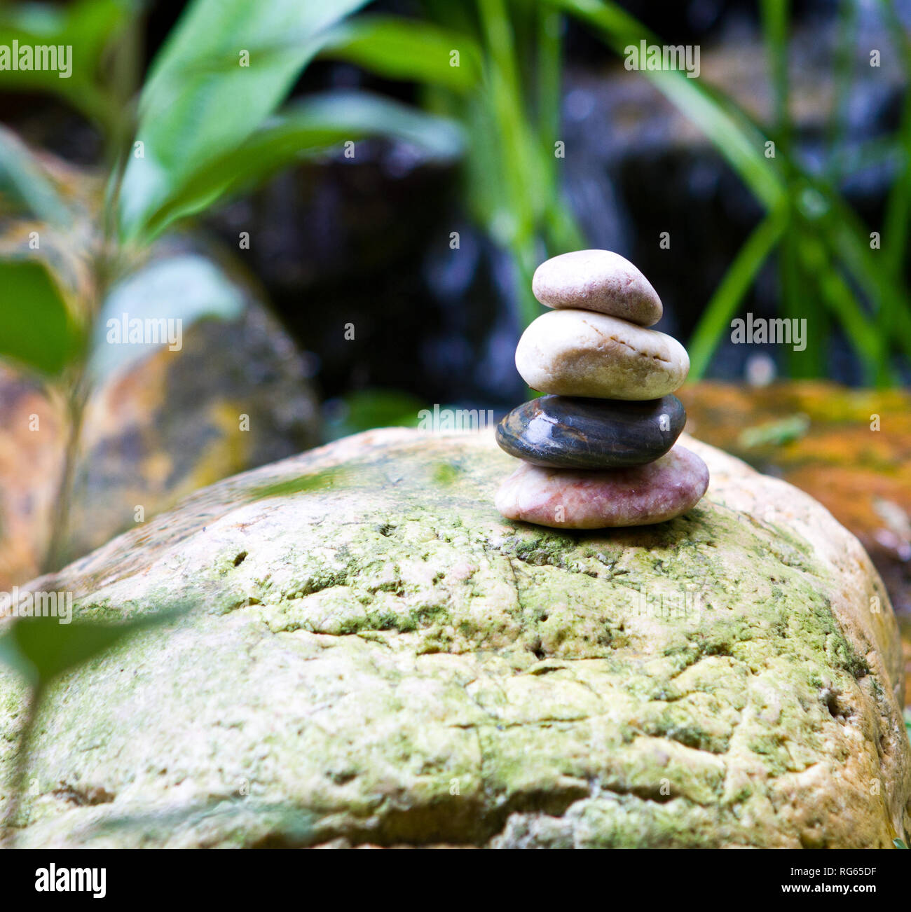Stones stacked up representing zen Stock Photo - Alamy