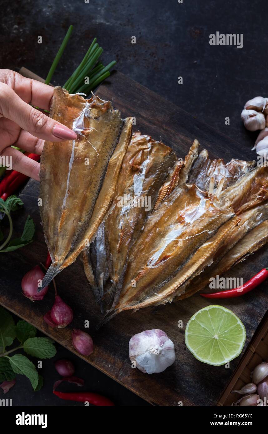 Dried lizard fish with ingredients Stock Photo - Alamy