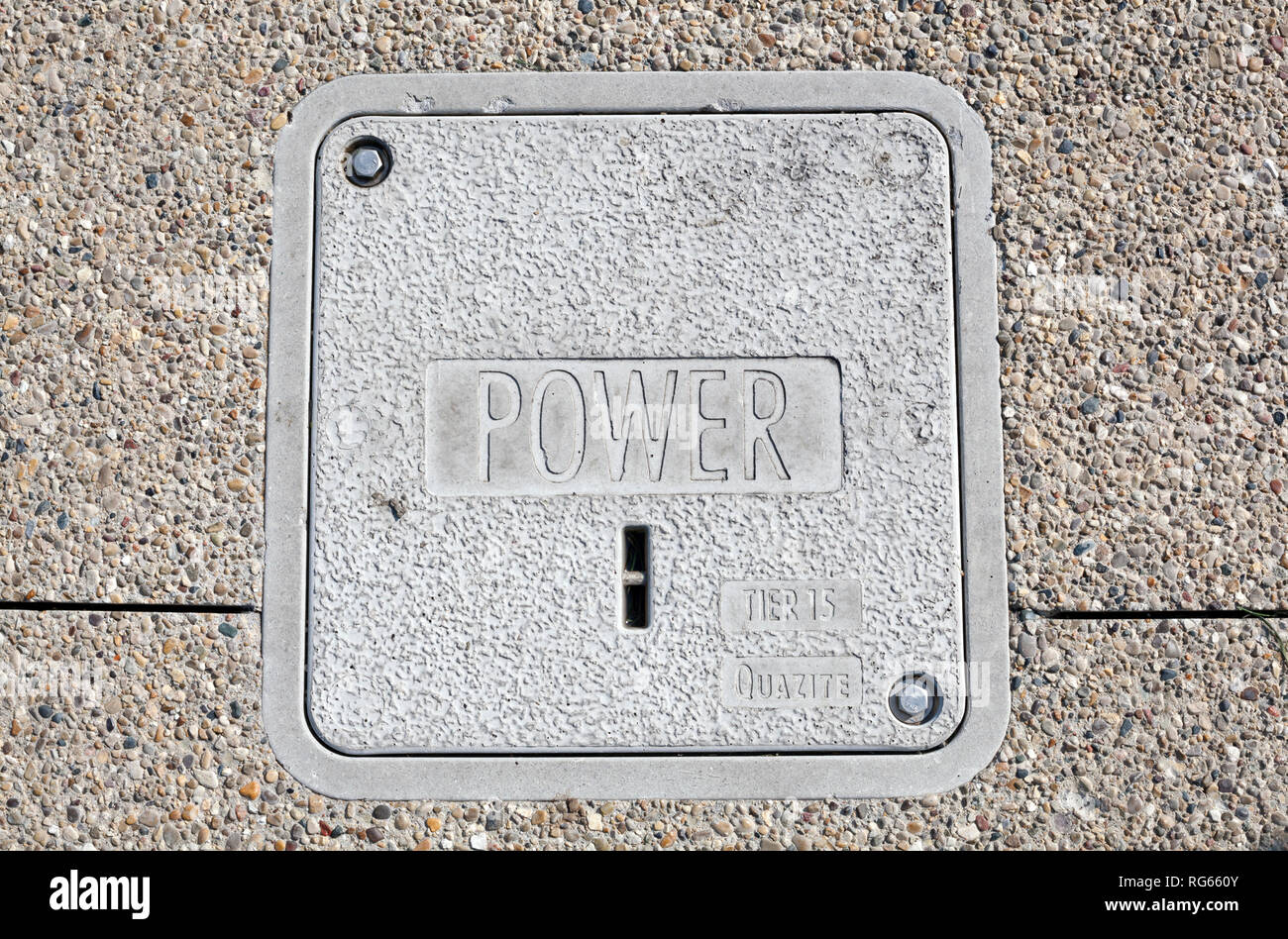 A utility access panel is built in to the sidewalk Stock Photo - Alamy