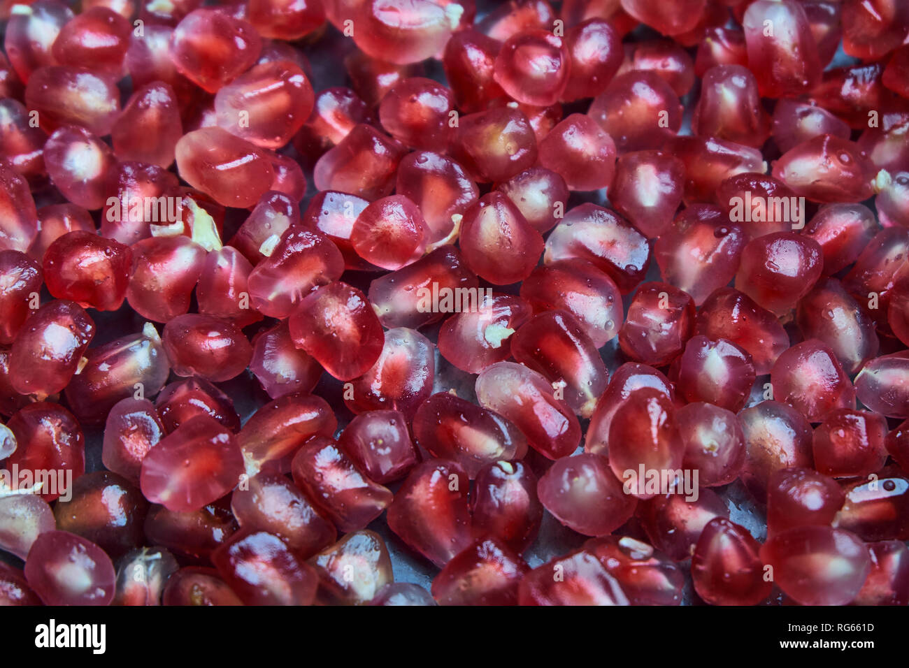 Red seeds of pomegranate Stock Photo - Alamy