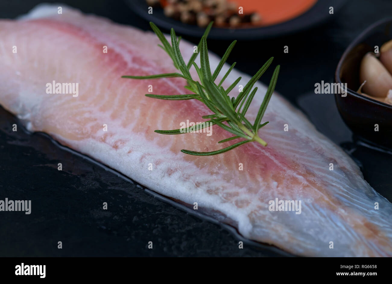 Preparing fish steak Stock Photo - Alamy