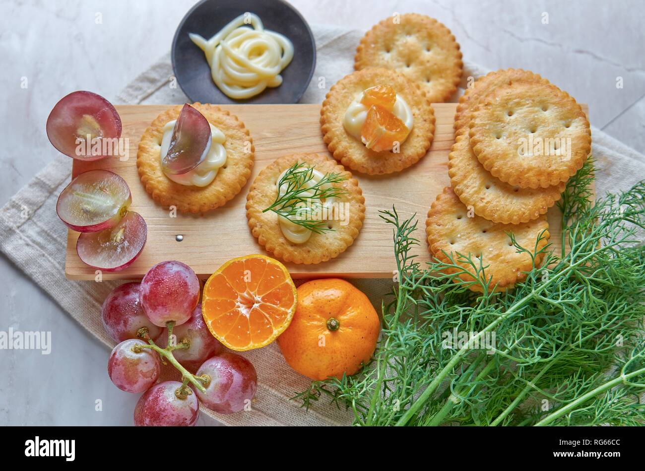 Biscuit Canape serving on wooden board Stock Photo - Alamy
