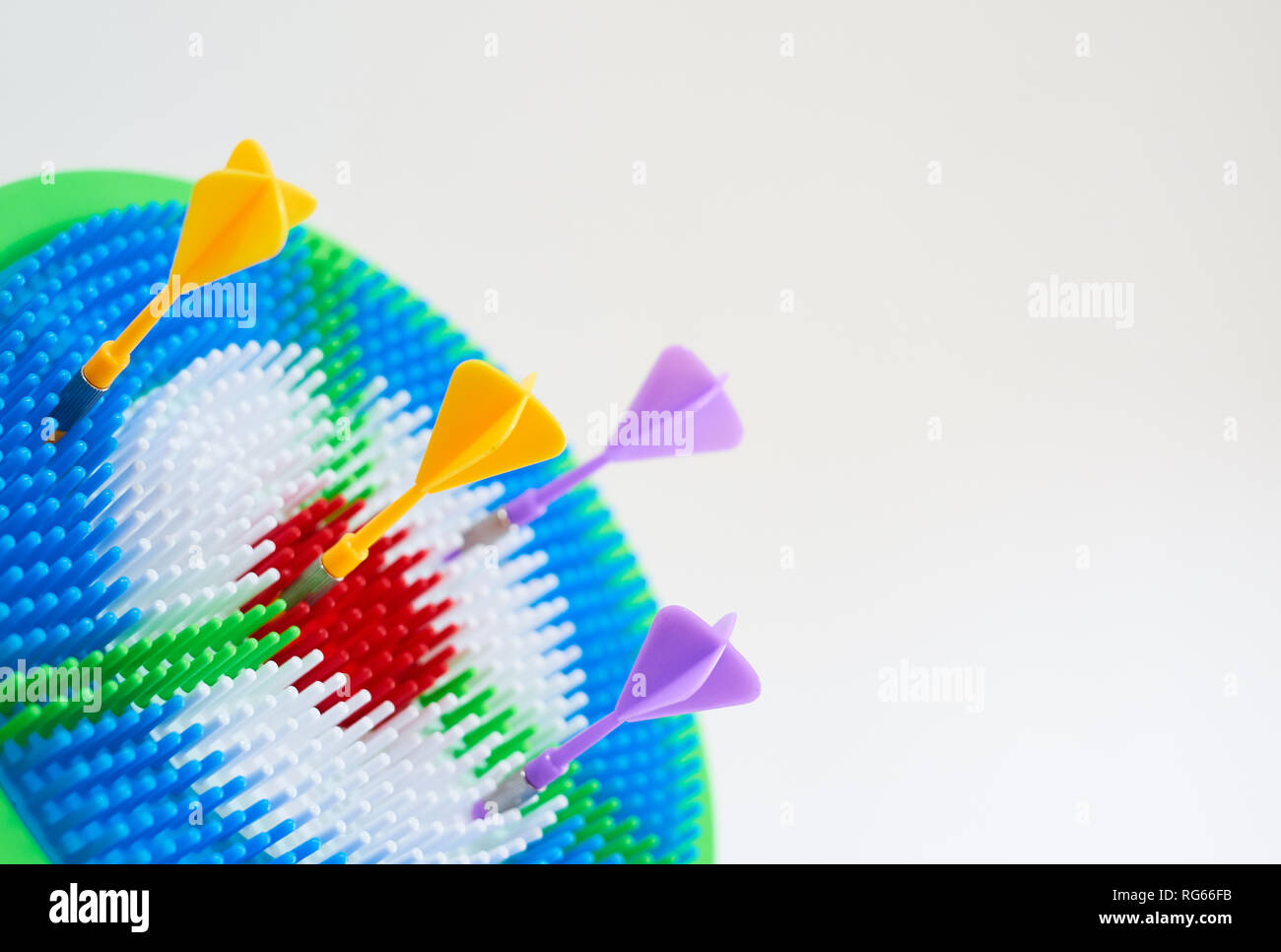 DartBoard with colorful darts Stock Photo - Alamy