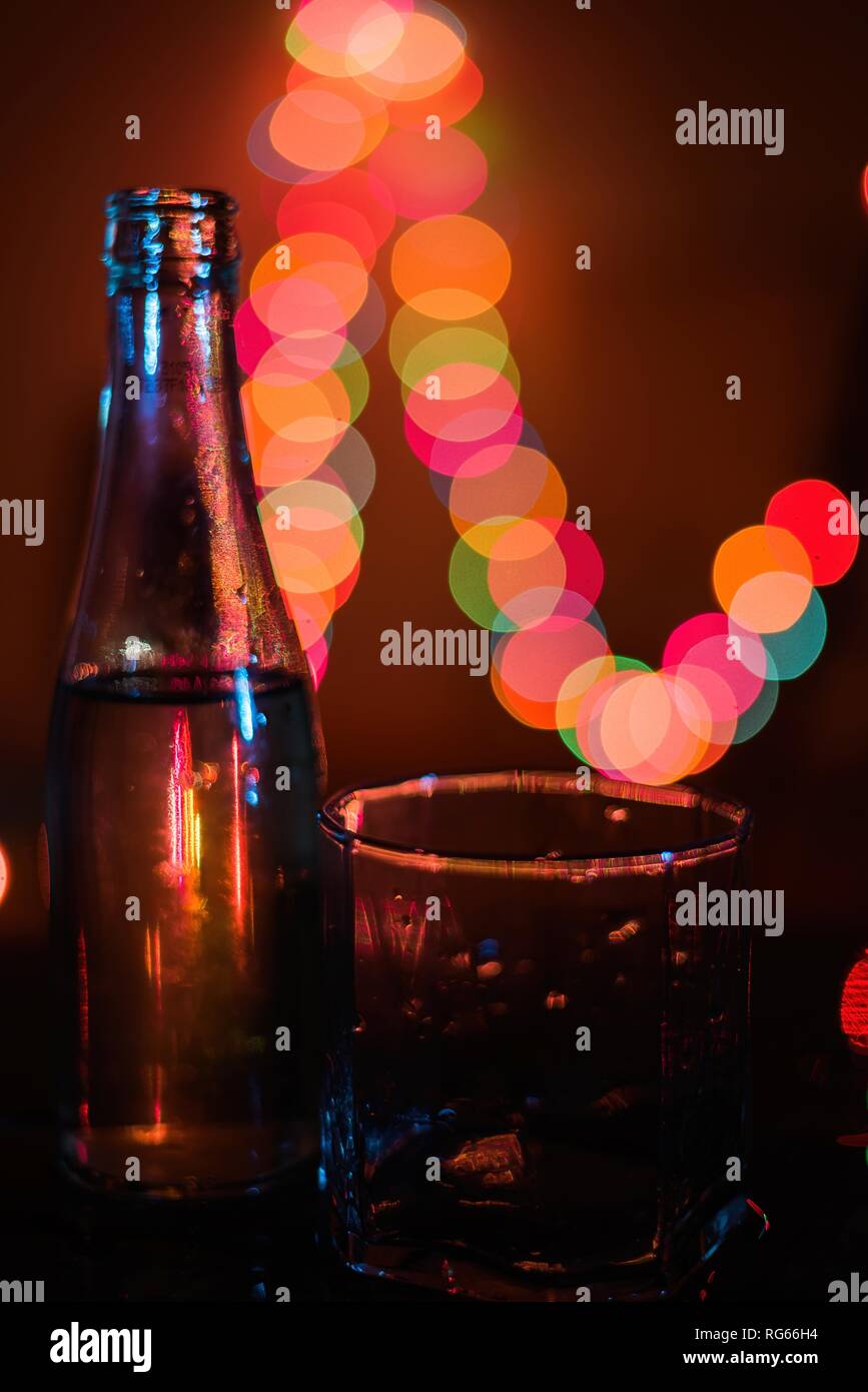 Buttle and glass with night light Stock Photo - Alamy