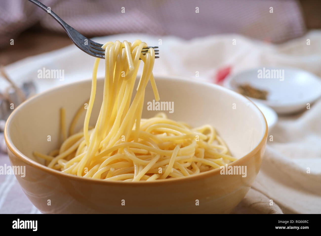 Cooked pasta in bowl Stock Photo - Alamy