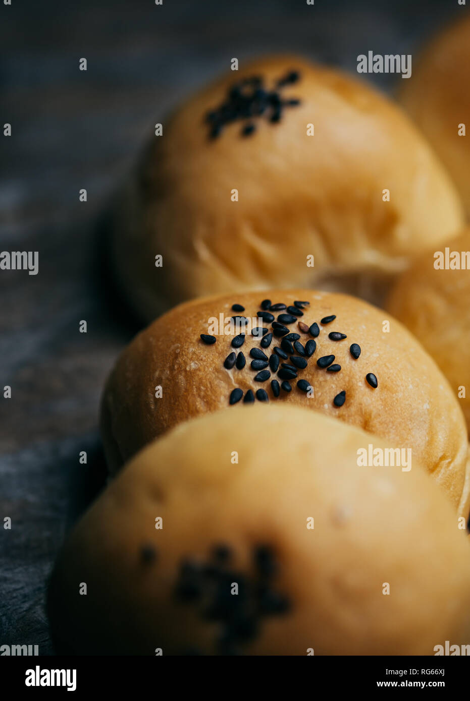 Sesame bun on table Stock Photo - Alamy