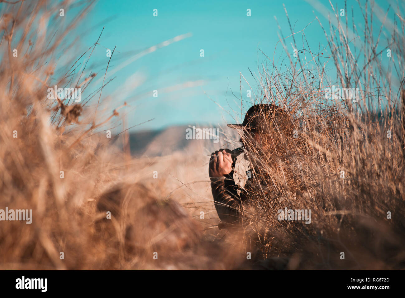 Coaxing hi-res stock photography and images - Alamy