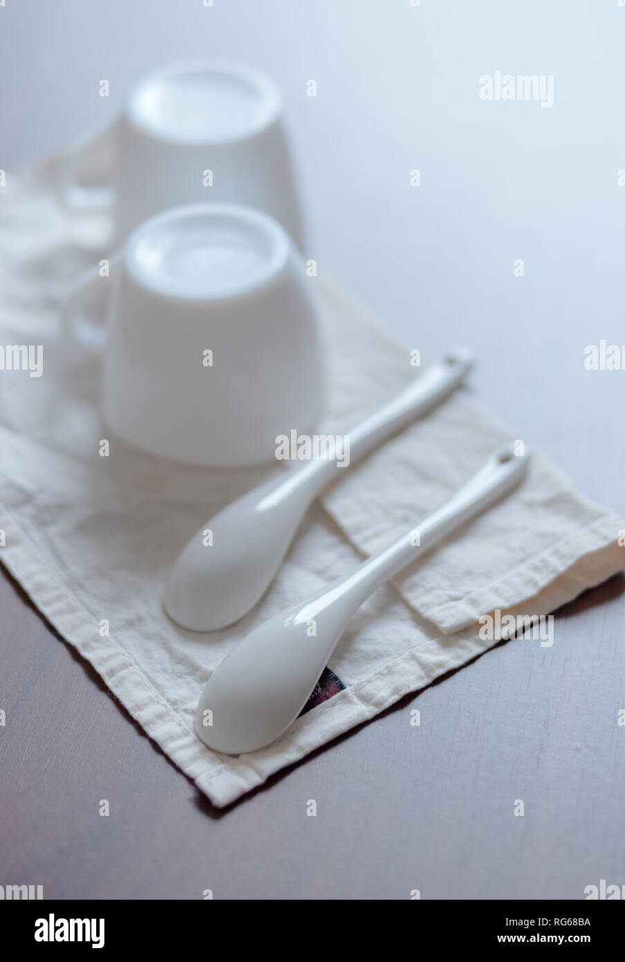 ceramic cup and spoon Stock Photo - Alamy