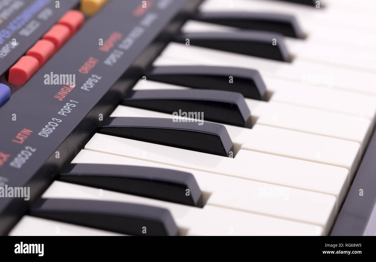 Small old keyboard, isolated on a white background Stock Photo - Alamy