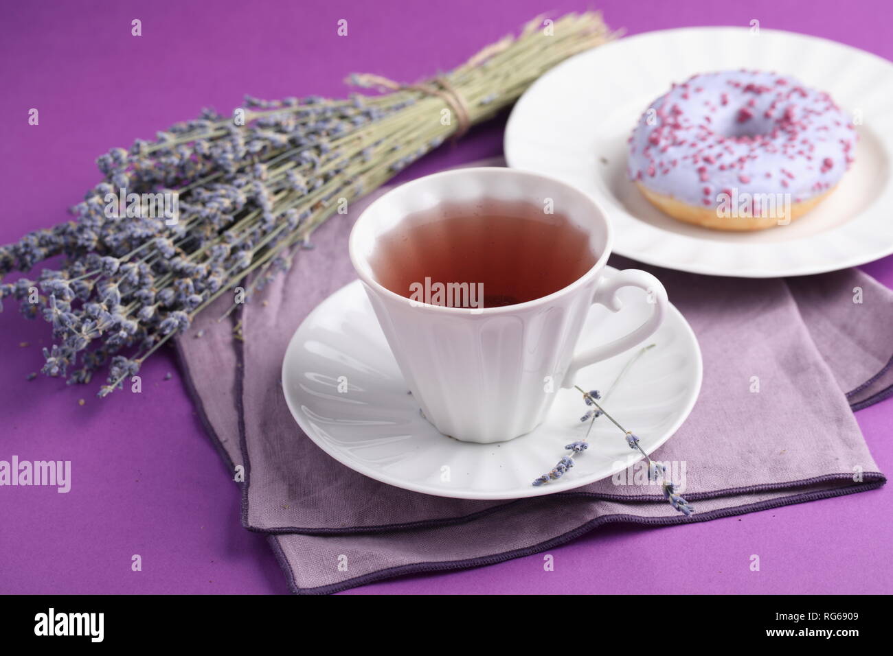 Lavender tea and lavender donut with bunch of lavender flowers Stock ...