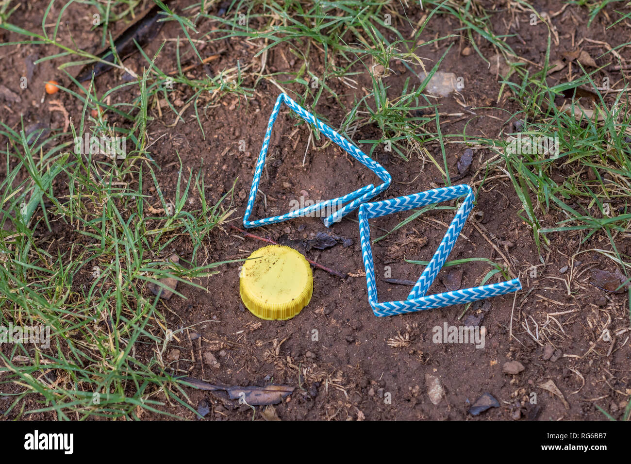 Single use plastic rubbish disposed of in the outdoors image with copy ...