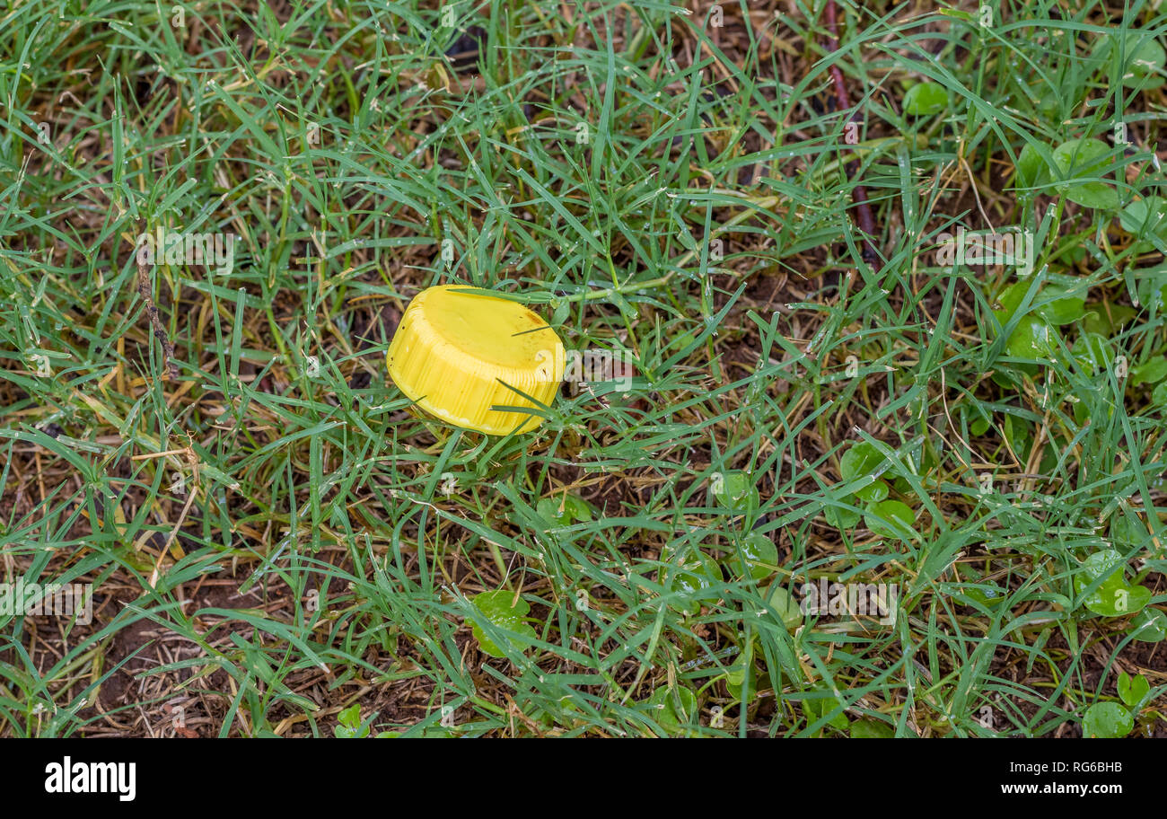 Single use plastic rubbish disposed of in the outdoors image with copy ...