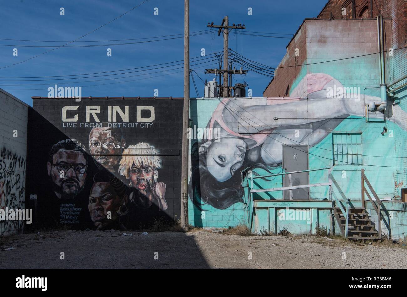 Portraits of a band and a picture of a woman form a huge mural on 13 ...