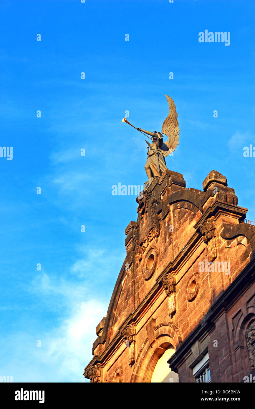 angel sculpture with a trombone and a sword on top of the Nuremberg ...