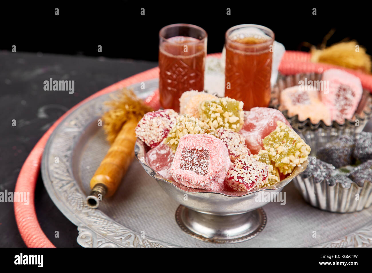 Set of various Turkish delight in traditional silver bowl on metal tray ...