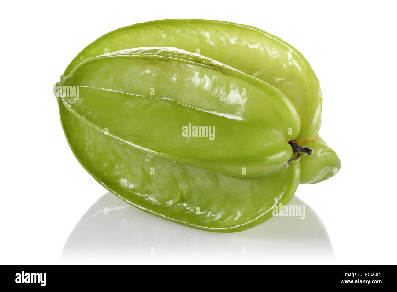 Single fresh star fruit isolated on white background Stock Photo - Alamy