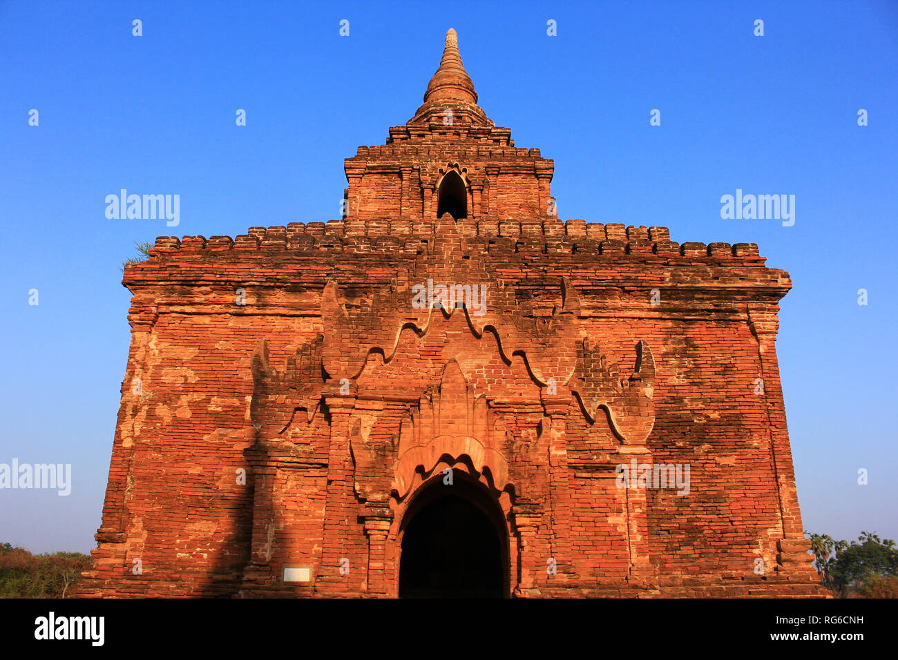 Bagan temple in with a clear blue morning sky in the hot first morning ...