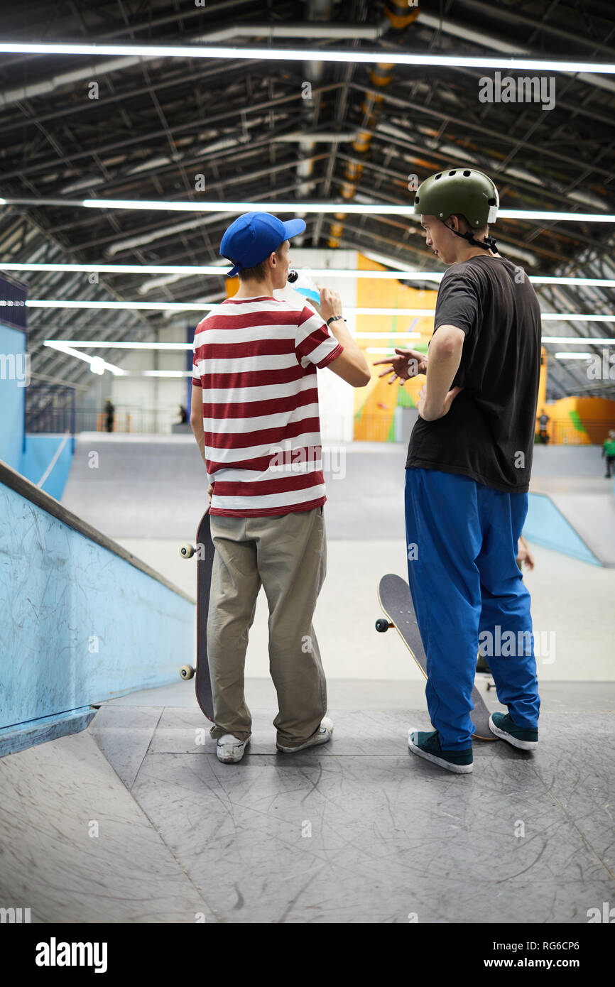 Consulting with friend Stock Photo - Alamy