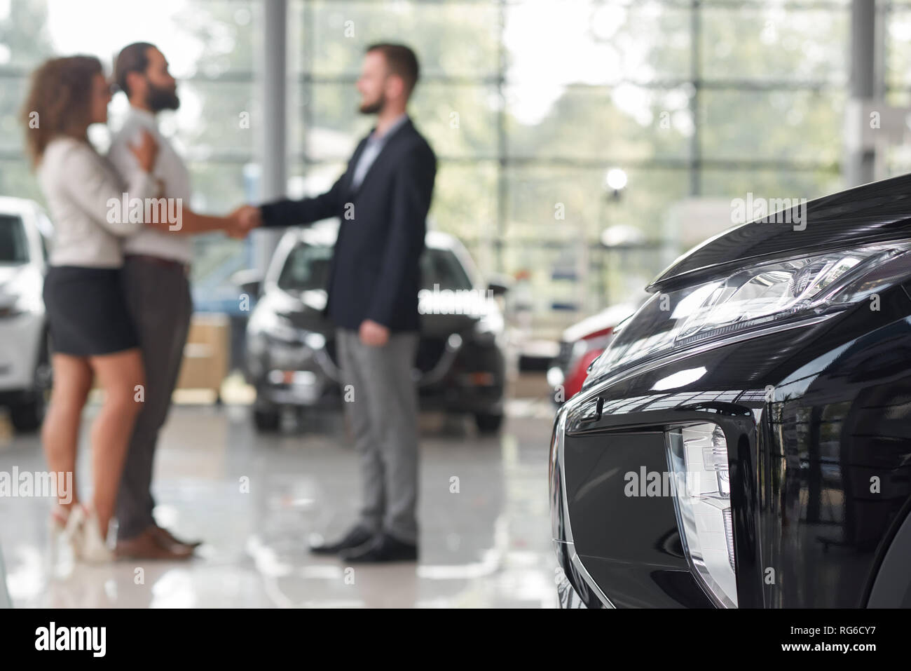 Man standing behind car hi-res stock photography and images - Alamy
