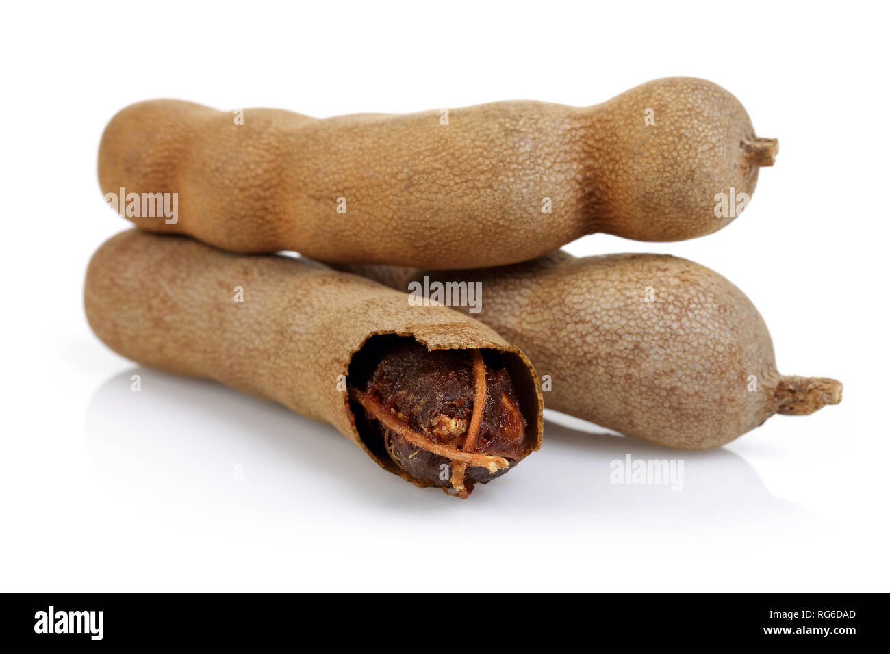 Sweet tamarind fruits isolated on white background Stock Photo - Alamy
