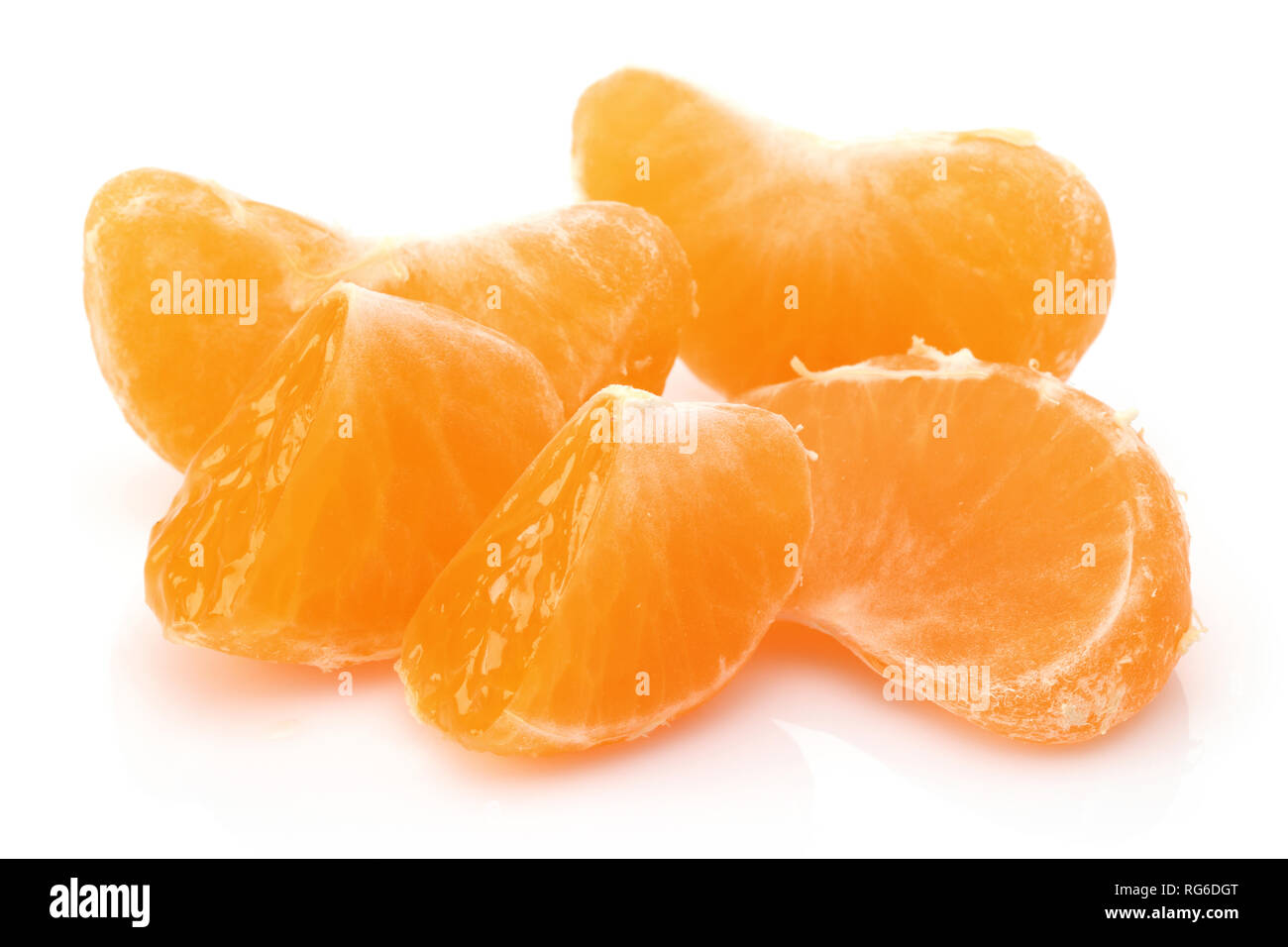 Peeled tangerine slices isolated on white background Stock Photo - Alamy