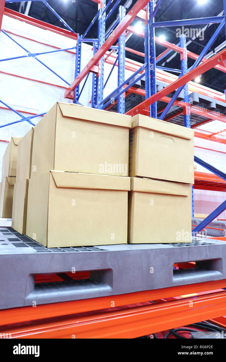 row of cotton boxes kept in warehouse shelves ; logistics Stock Photo ...