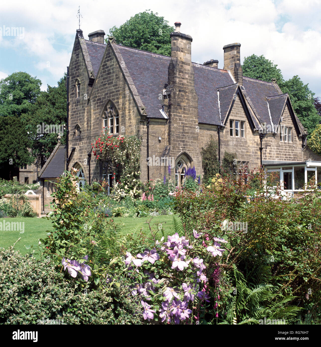 Exterior of large Gothic style country house Stock Photo - Alamy