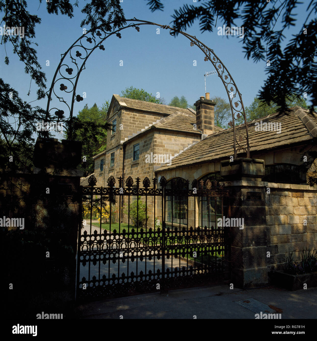 Wrought iron gates to country house Stock Photo - Alamy