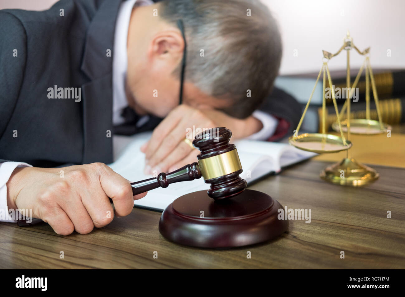 lawyer tried or stress from hard working Stock Photo - Alamy