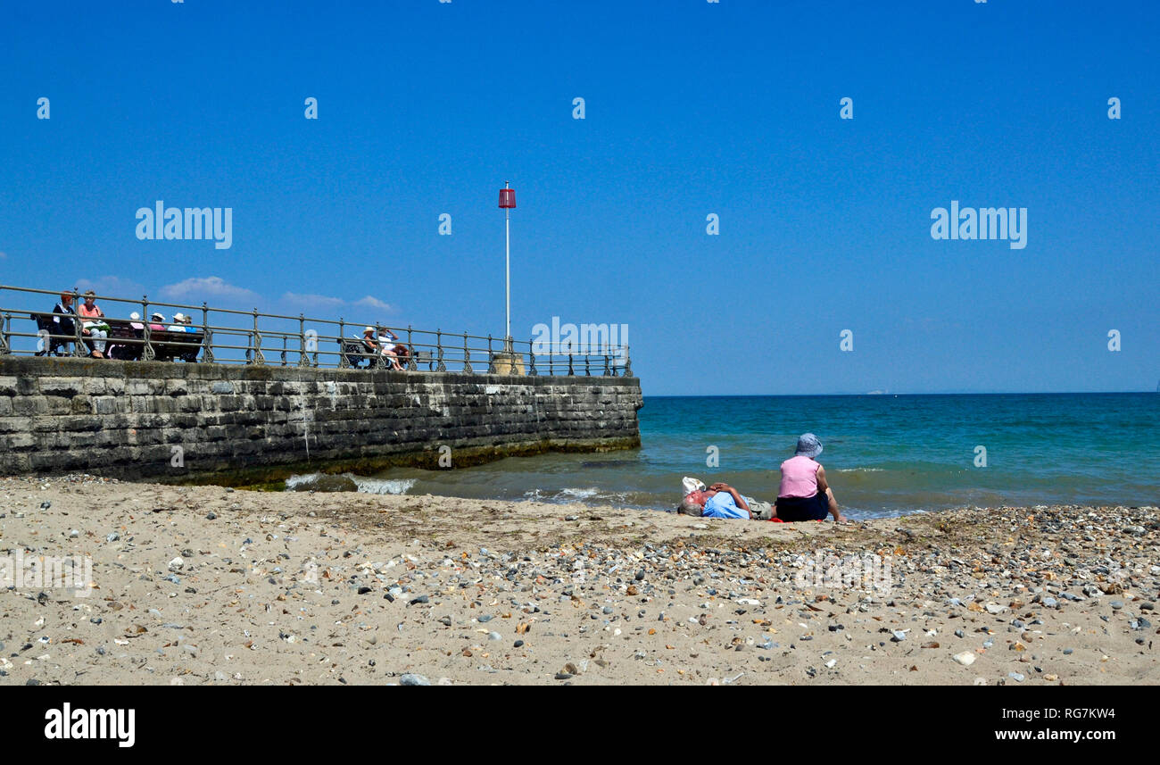 Old People relaxing on the beach at Swanage Beach, Isle of Purbeck ...