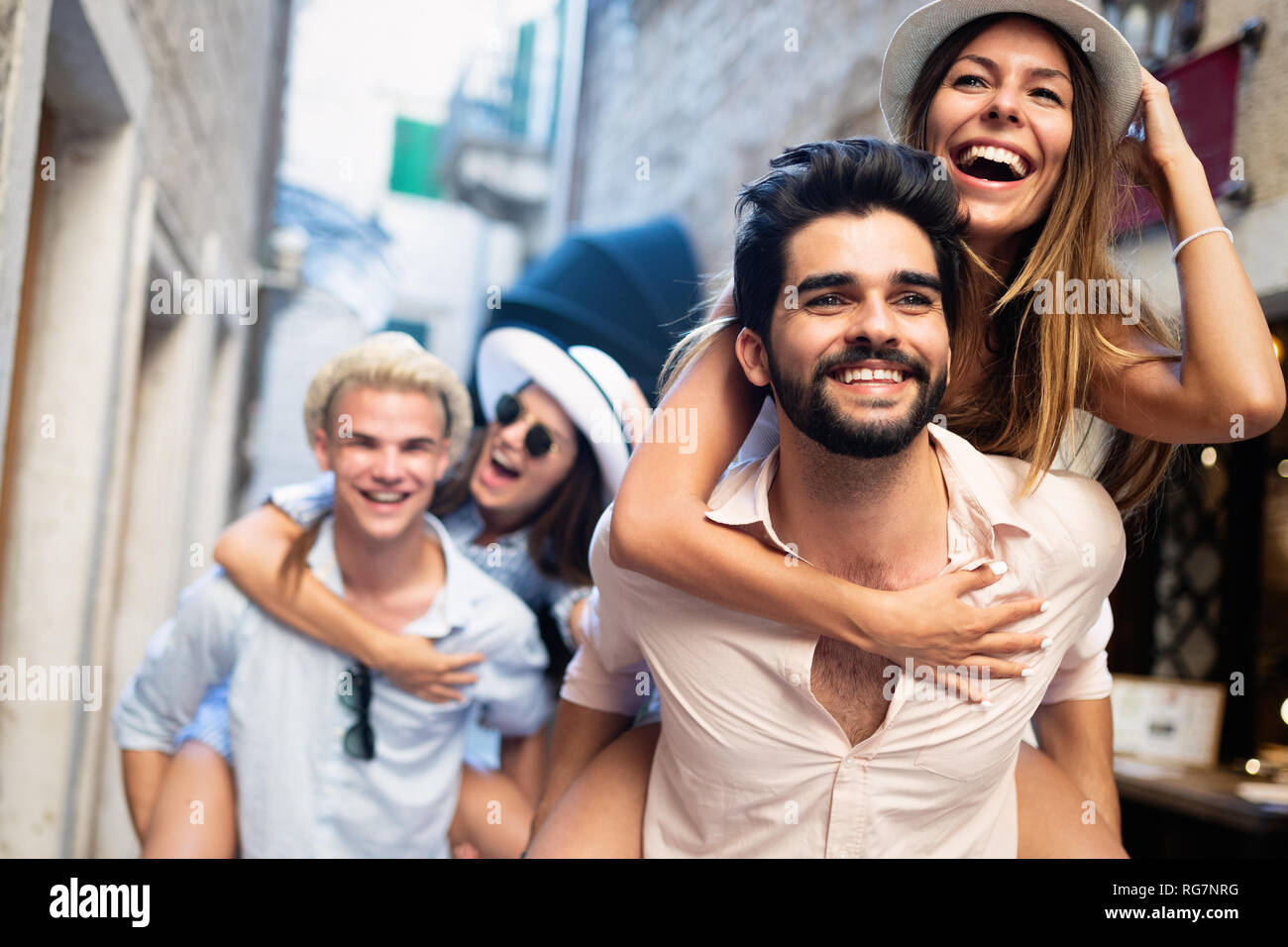 Group of happy friends enjoying sightseeing tour in the city Stock ...