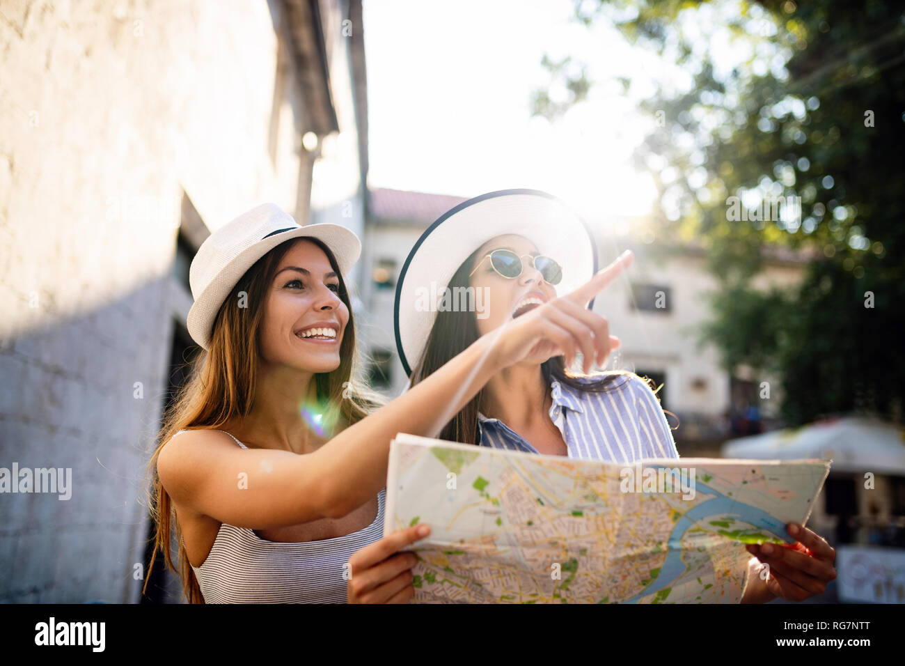 Girl friends travelling summer vacation exploring to discover carefree ...