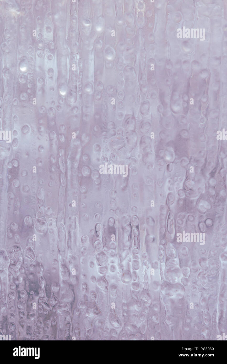 Frozen window in winter with drops and drips Stock Photo - Alamy