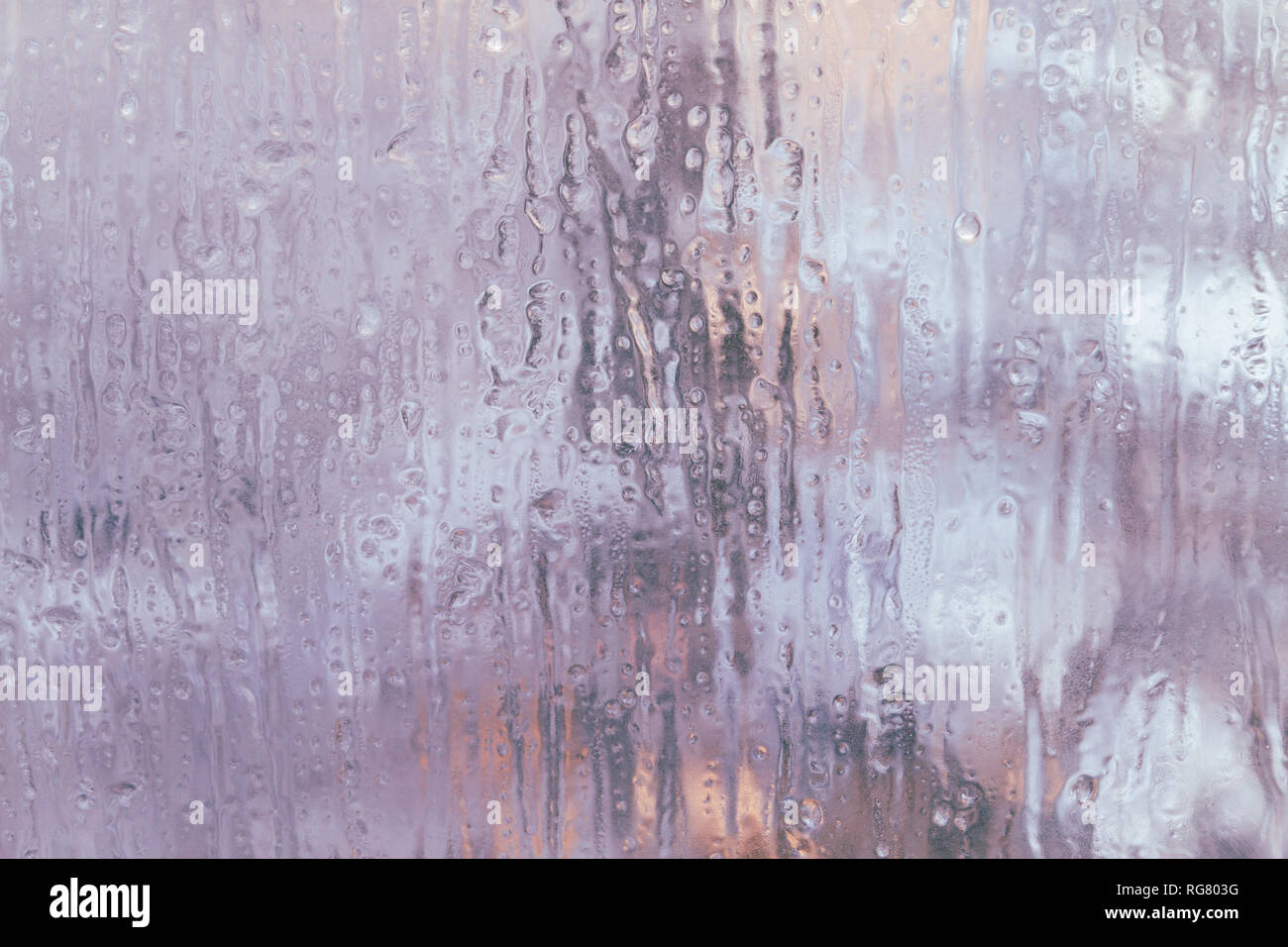 Frozen window in winter with drops and drips Stock Photo - Alamy