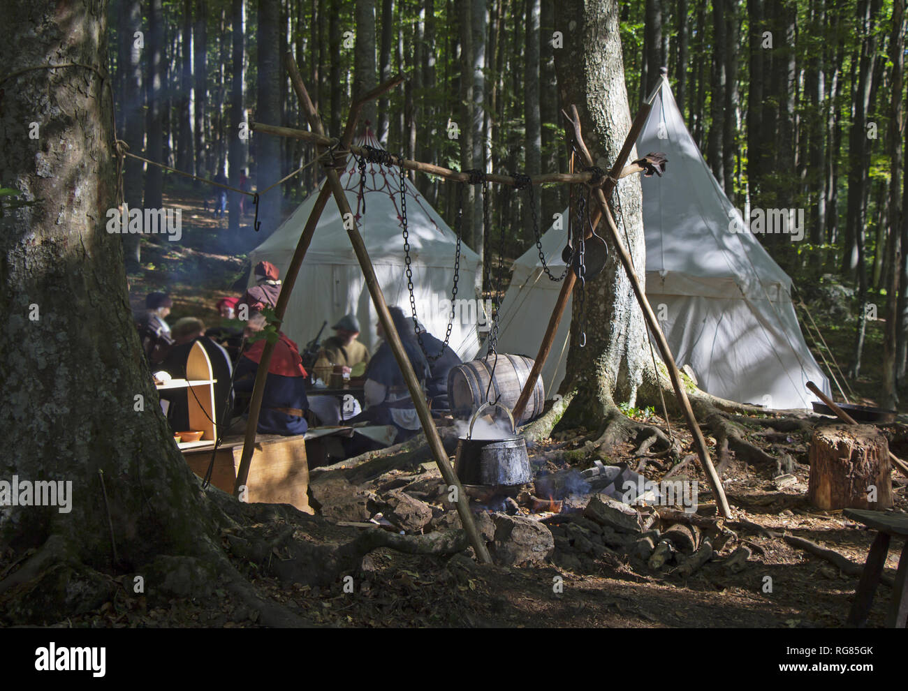 Medieval Camp in the forest cooking in the kettle Stock Photo - Alamy