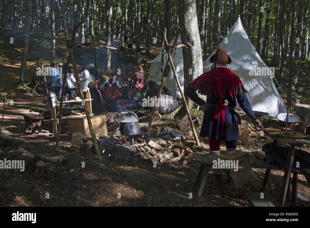 Medieval Camp in the forest cooking in the kettle Stock Photo - Alamy