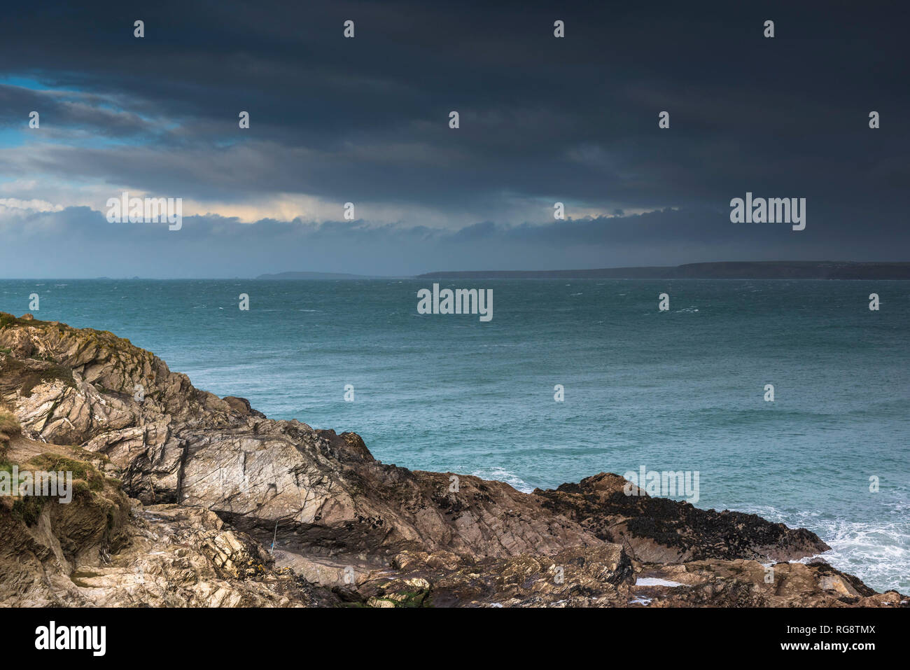 Heavy rain clouds over Newquay Bay in Cornwall Stock Photo - Alamy