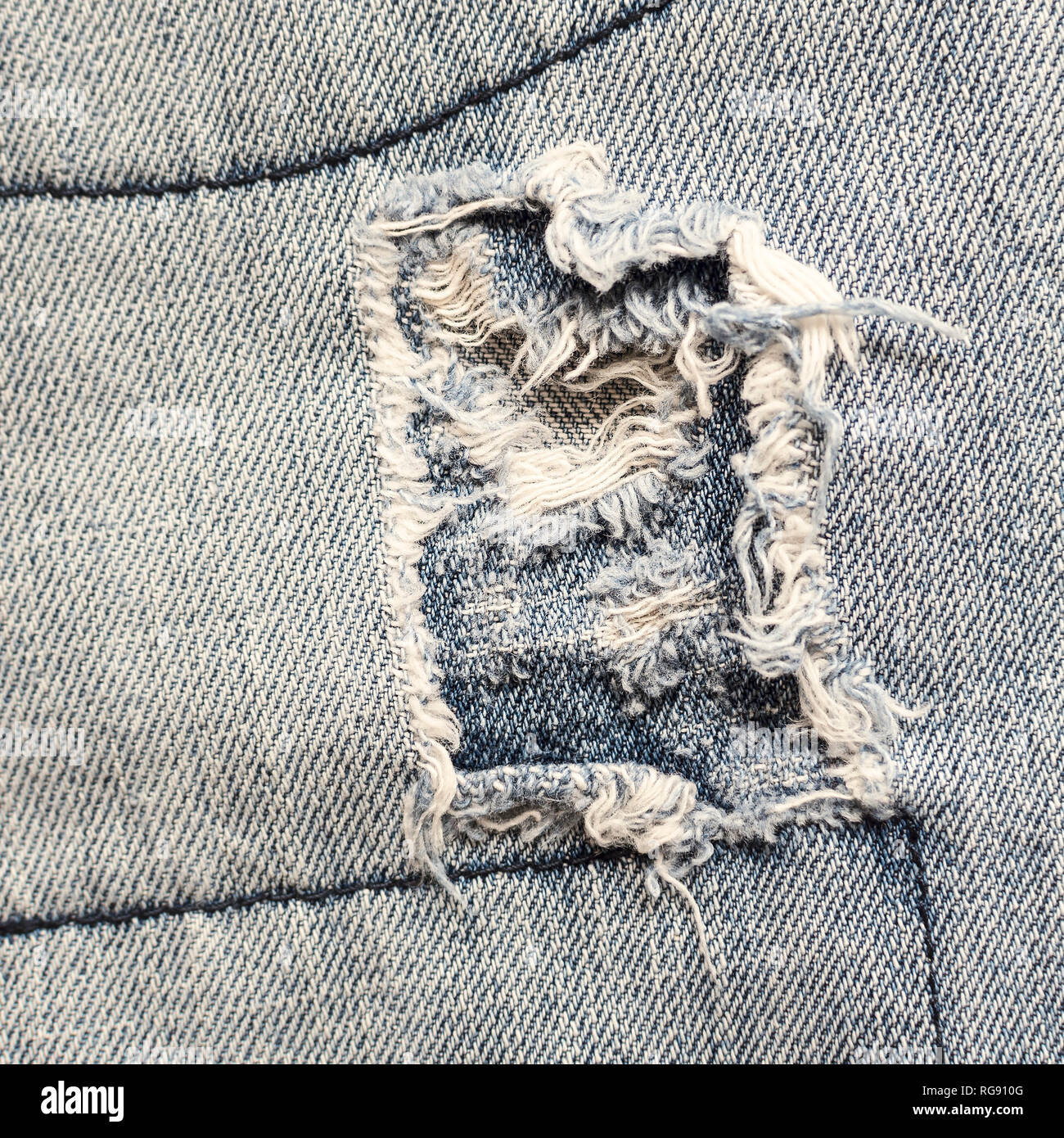 Torn denim pants hi-res stock photography and images - Alamy