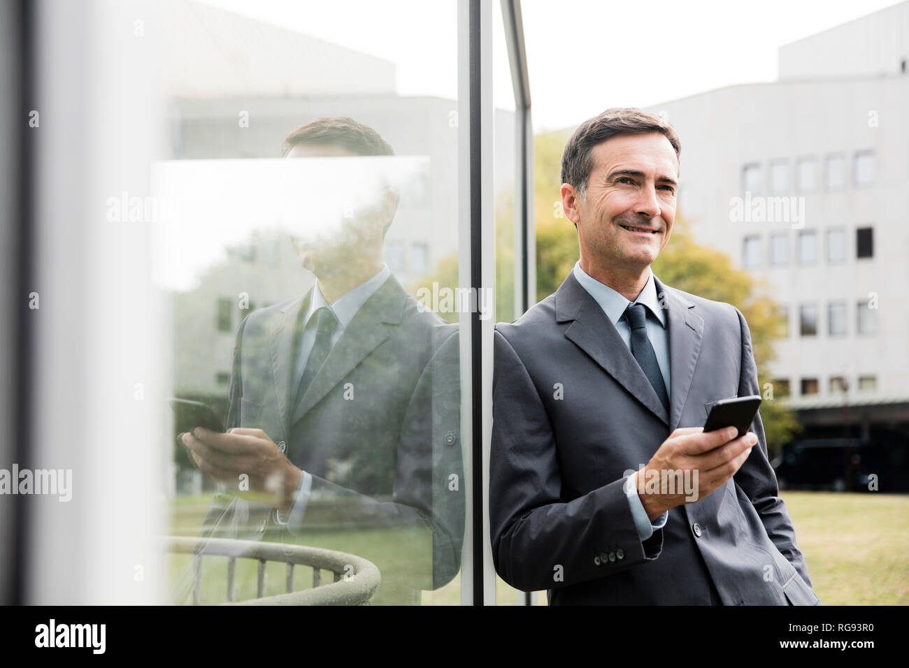 Leaning against glass hi-res stock photography and images - Alamy