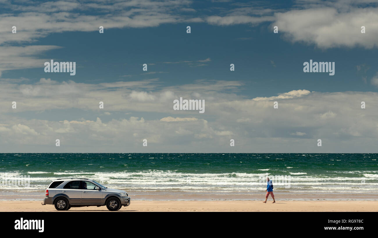 Person on beach hi-res stock photography and images - Alamy